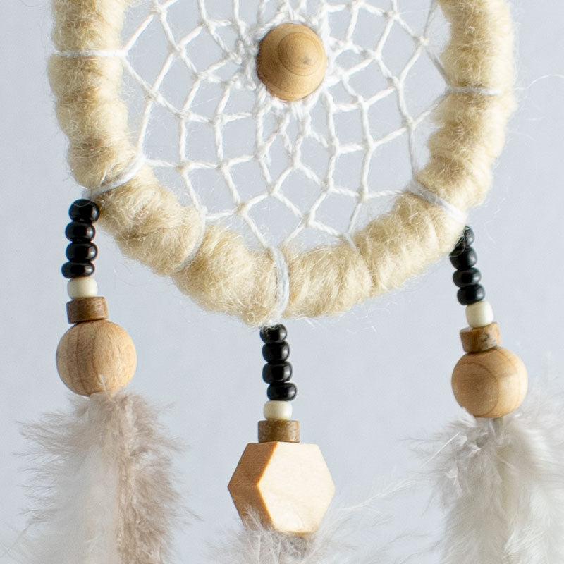 Mini attrape-rêve beige "Aigle éclairé" – Le Nuage et la Dune